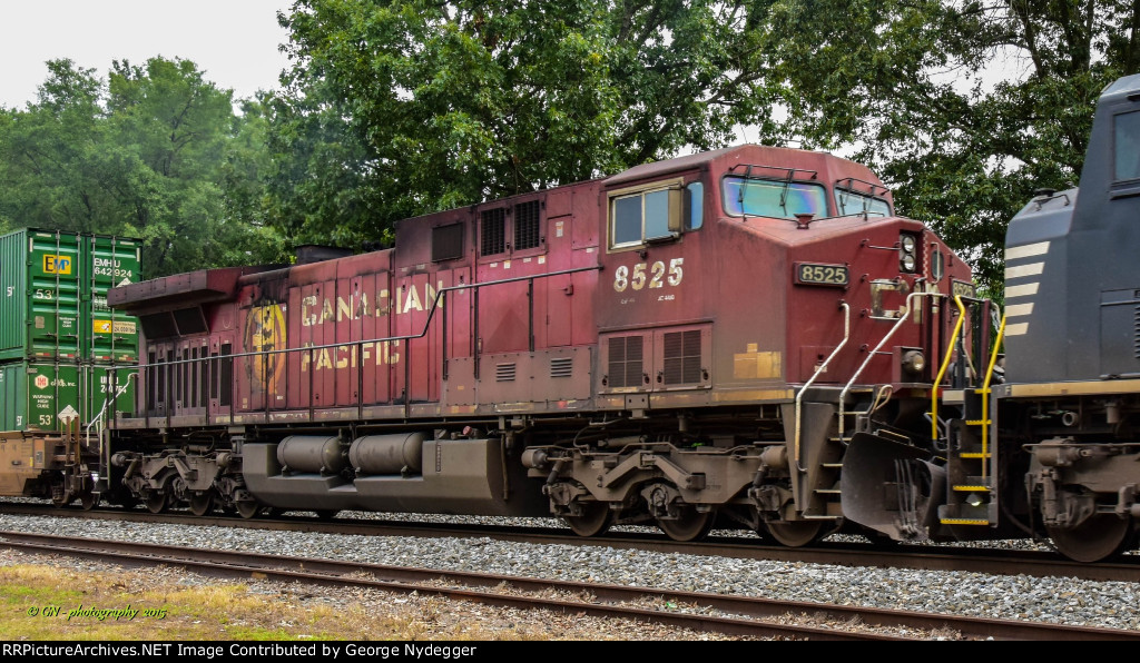 CP 8525 / AC44CW is the 3rd engine on a south bound intermodal train